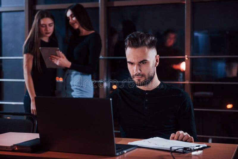 Other People in the Reflection. Team of Young Business People Works on ...