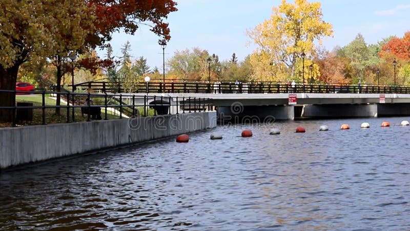 Rideau River and Hog S Back Bridge in Fall Season Stock Video - Video ...