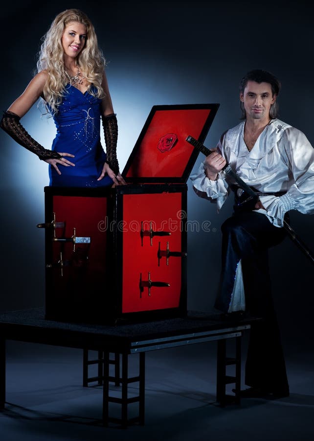 Ouple Performing Sword Box Illusion Stock Photo - Image of perform ...