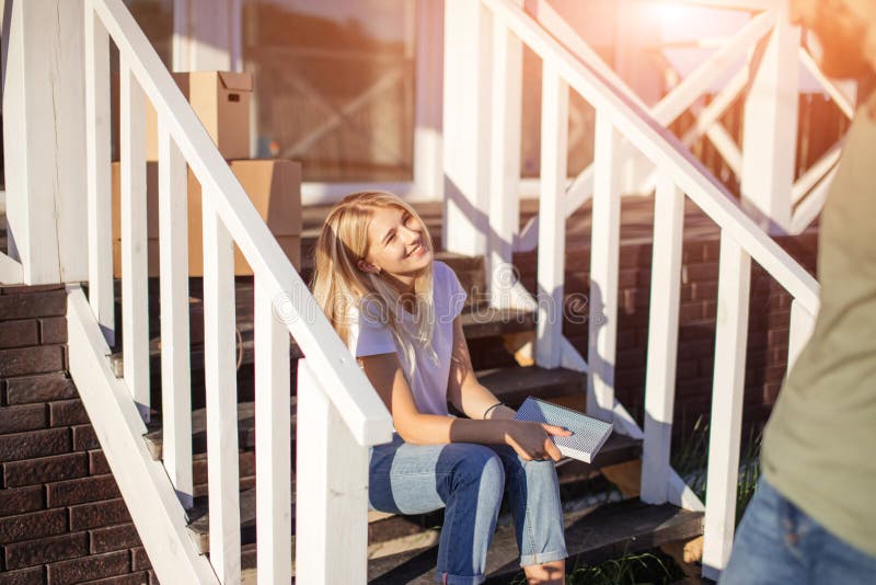 First Home Swith New Home Owners on Step Stock Photo - Image of home ...