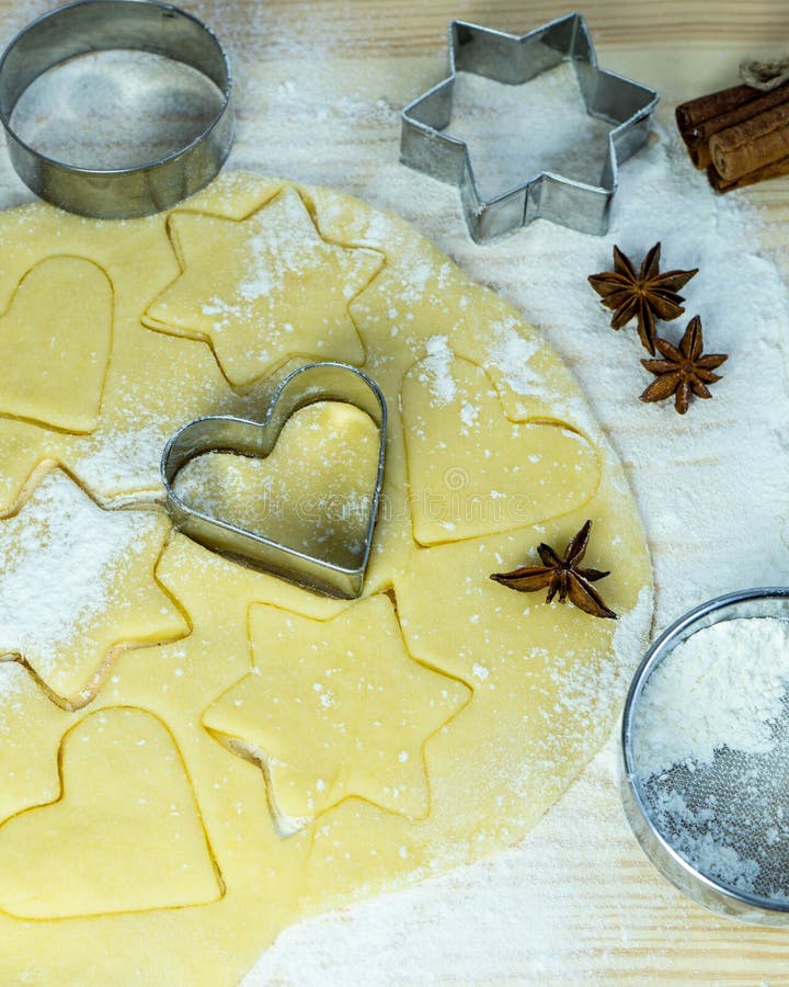 With Our Hands, we Press the Heart-shaped Cookie Cutter into the Dough ...
