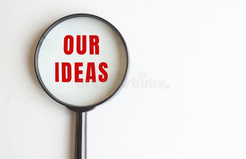 OUR IDEAS Text Written on Gray Background. we Read it through a ...