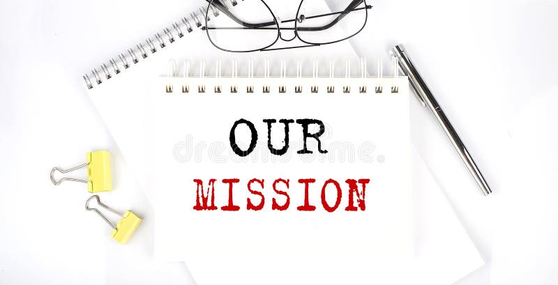 OUR MISSION Text on the Notebook with Pen,clips and Glasses Stock Image ...