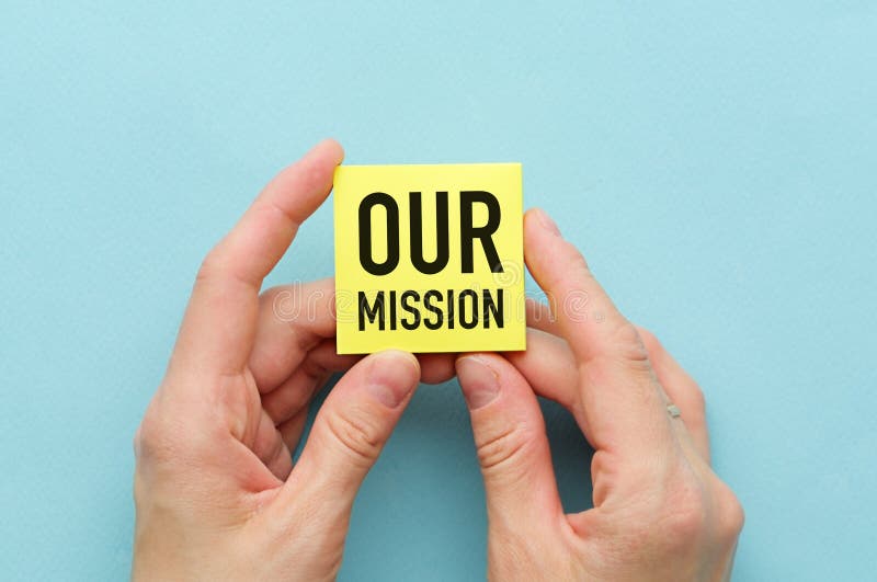 OUR MISSION Text Written on Sticky in Hands on Blue Background Stock ...