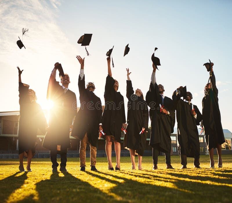Students Throwing Their Graduation Caps Stock Photos - Free & Royalty ...