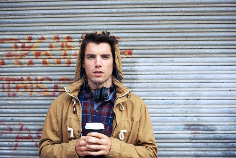 Out and about, Around Downtown. a Handsome Young Man Chilling in a ...