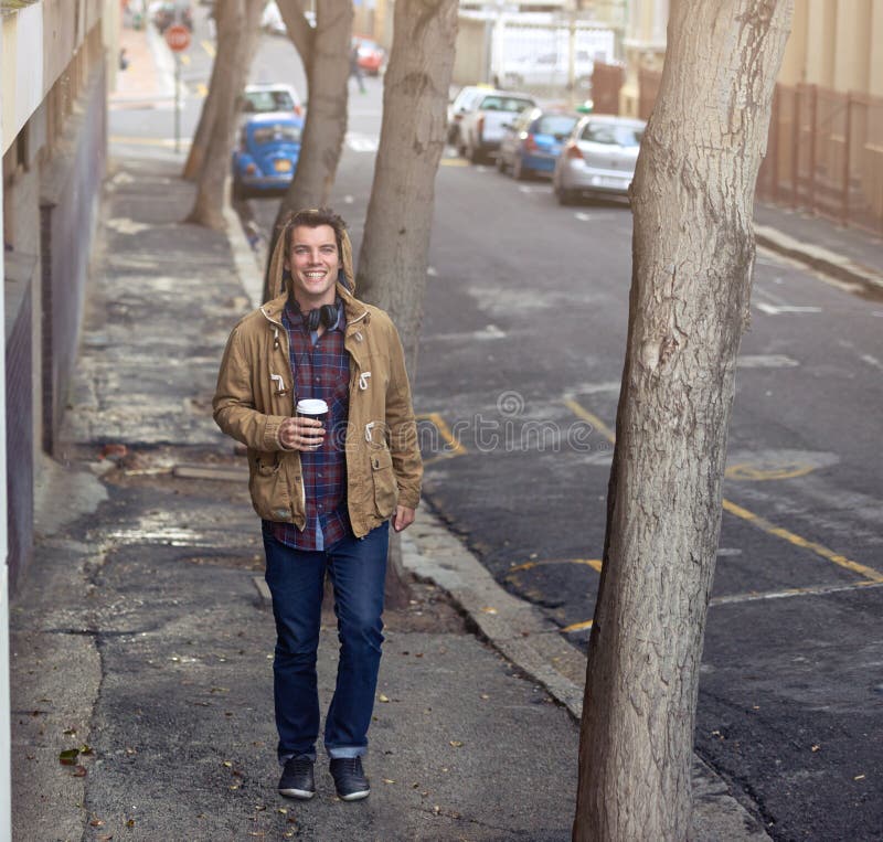 Out and about, Around Downtown. a Handsome Young Man Chilling in a ...