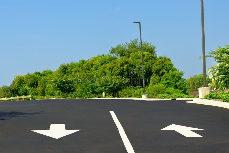 In and Out Arrows in New Parking Lot Stock Photo - Image of asphalt ...