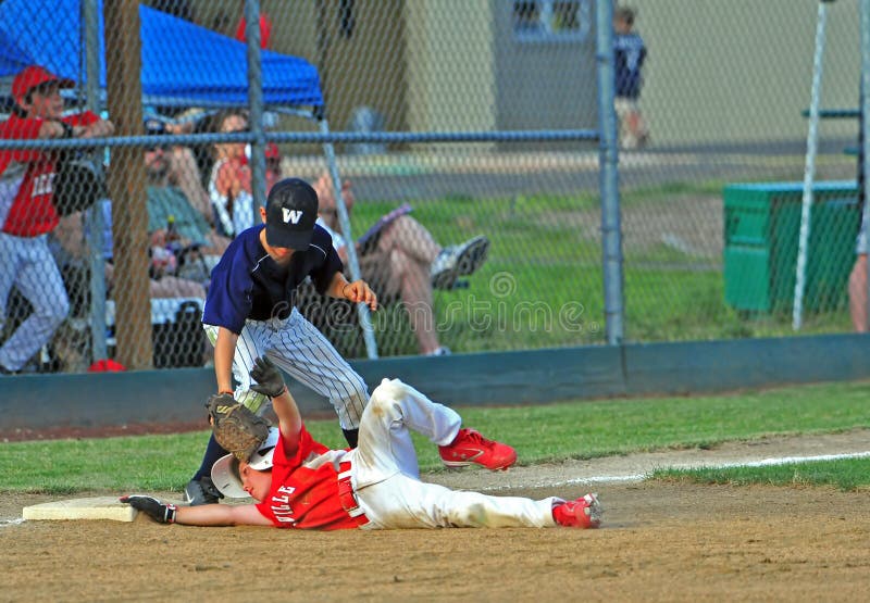 Out at Third Base. editorial image. Image of devyn, runner - 54124165