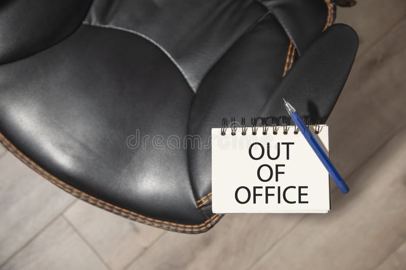 Out of Office Message on Notepad with a Office Chair Stock Image ...