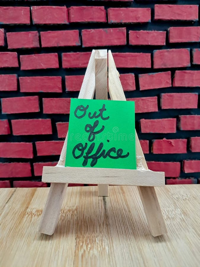 Out of Office Message on a Wood Easel Stock Image - Image of floor ...