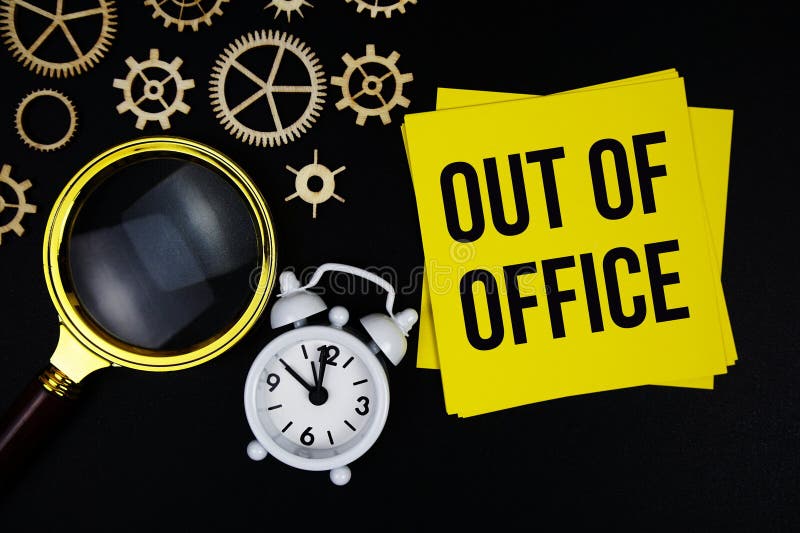 Out of Office Text Message on Sticky Note with Magnifying Glass and ...