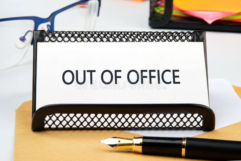 OUT of OFFICE Words Written in a Business Card on a Stand Stock Photo ...