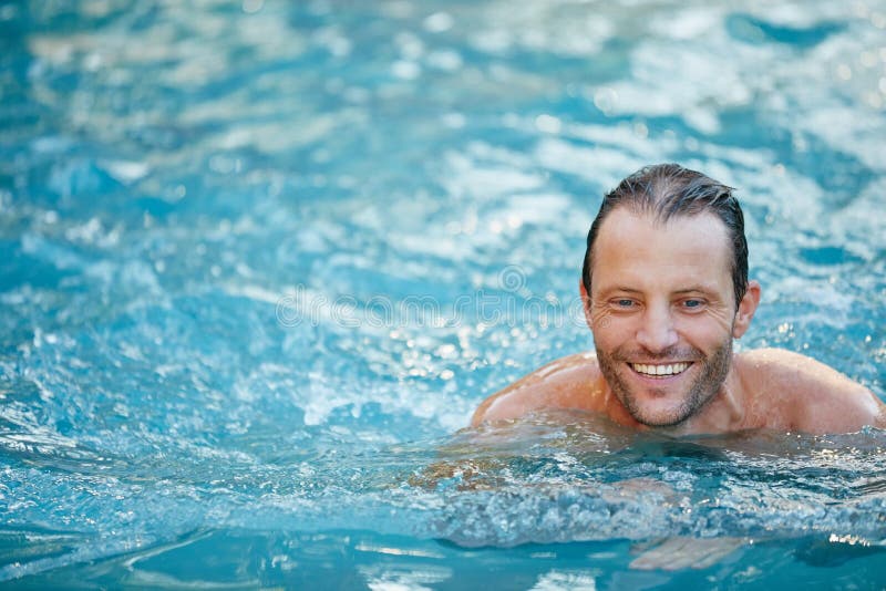 Out for a Relaxing Swim. a Handsome Man Swimming in a Pool. Stock Image ...