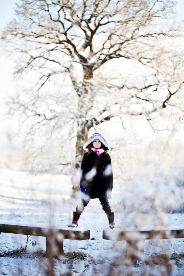 Out in the snow stock photo. Image of coat, girl, woods - 18541858