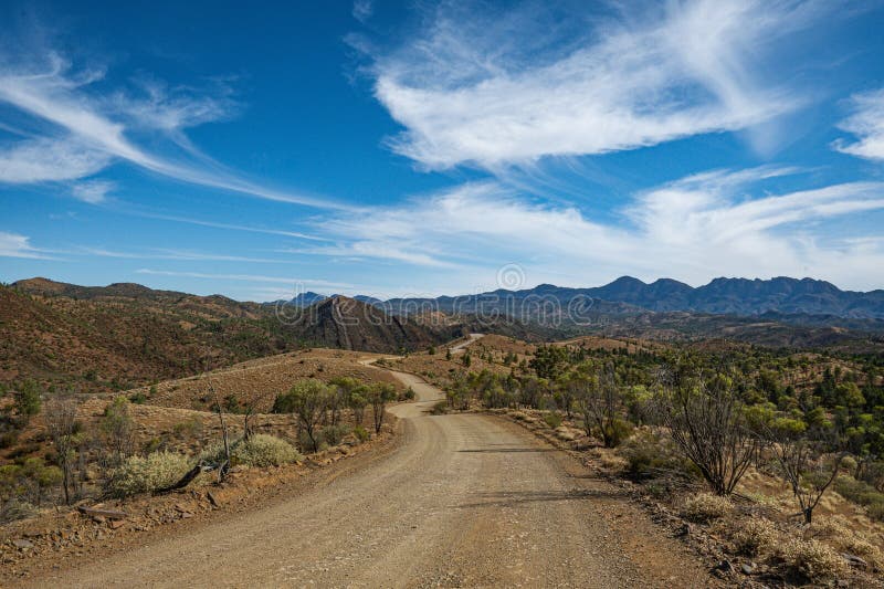 Outback Road with Mountainous Backdrop Stock Image - Image of ...