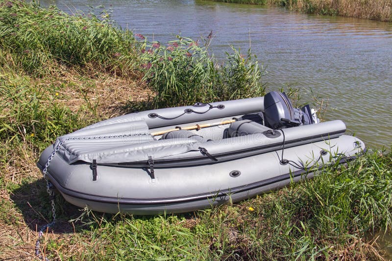 Outboard Rubber Boat Pulled To the Riverbank Stock Photo - Image of ...