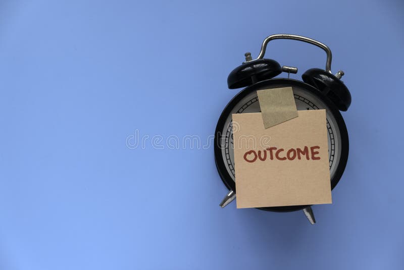 Outcome Concept. a Note Written with Outcome on Alarm Clock Stock Image ...
