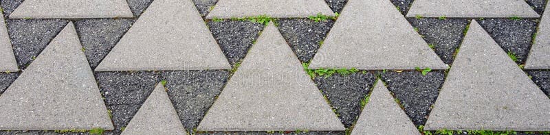 Outdoor Asphalt Patio with Triangular Shaped Concrete Inserts Stock ...