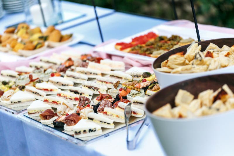 Outdoor Banquet Table with Many Snacks and Delicacies Stock Photo ...