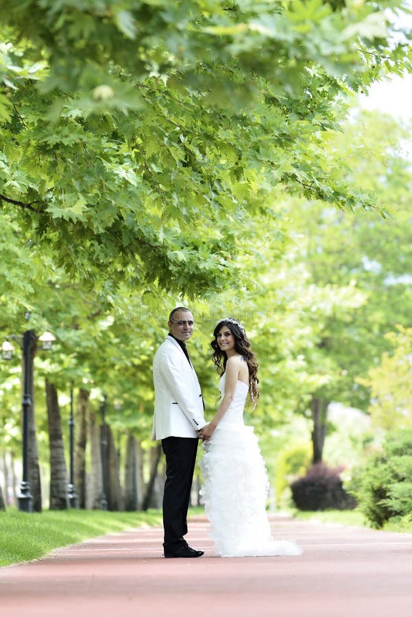 Outdoor Bride and groom stock photo. Image of diamonds - 41660778