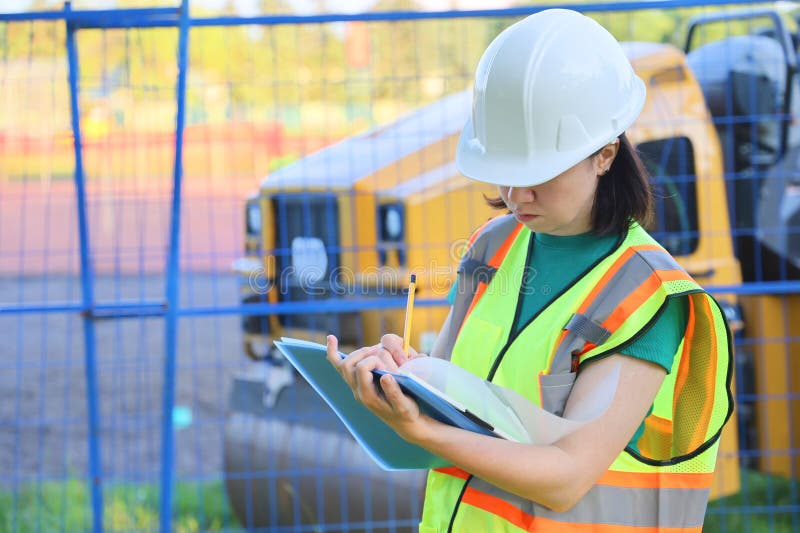 Outdoor Builder Woman Portrait, Construction Worker Reading Blueprints ...
