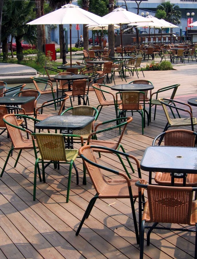 Outdoor Cafe stock photo. Image of waiter, chairs, palm - 209638