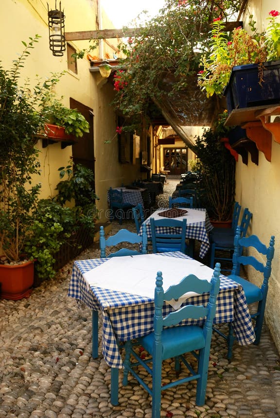 Outdoor cafe stock image. Image of rhodes, flower, relaxation - 7033269
