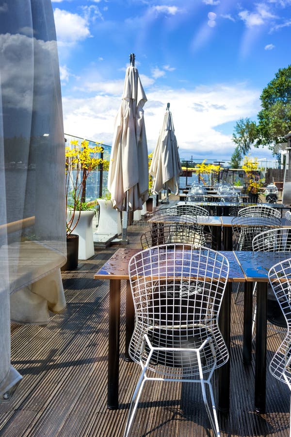 Outdoor Cafe Behind Glass in the Spring after the Rain Stock Image ...