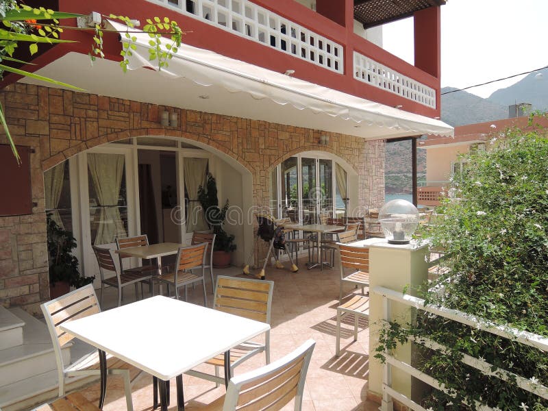 Outdoor cafe in Greece stock photo. Image of story, greece - 72761540