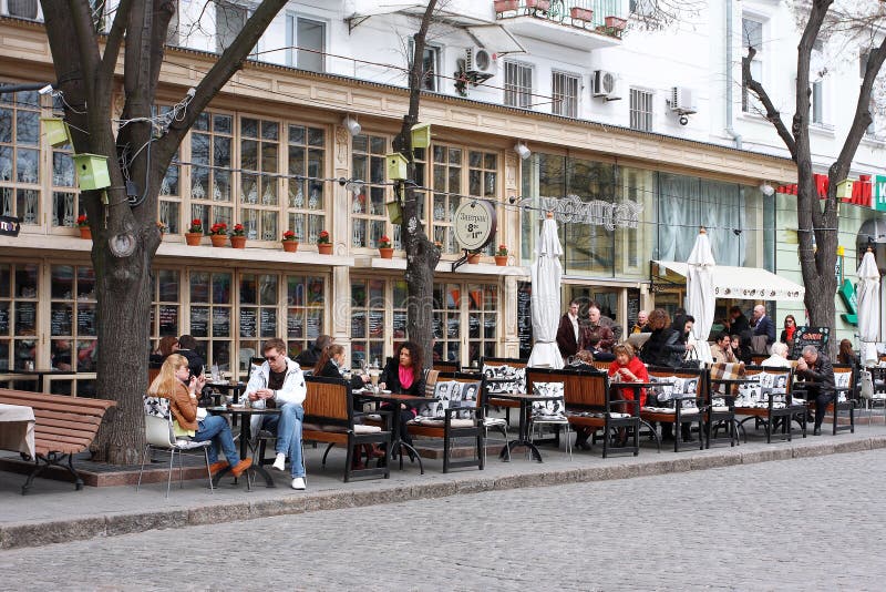 Outdoor cafe on the street editorial photography. Image of break - 24581597