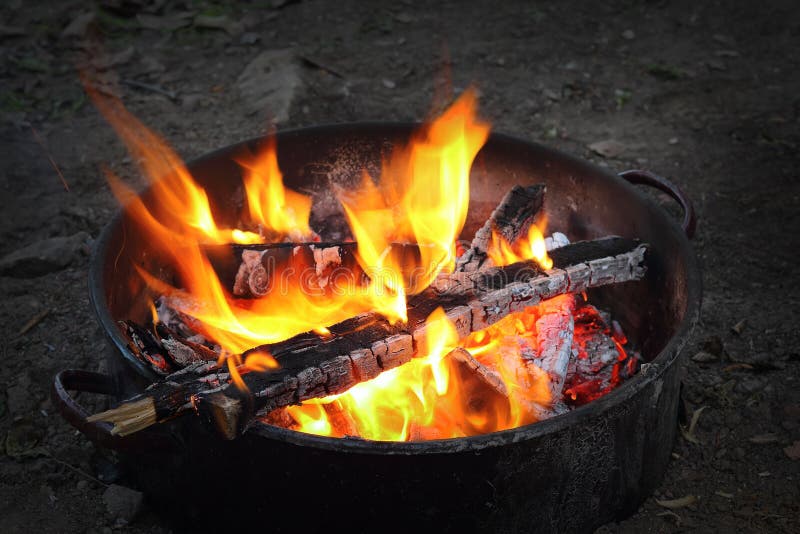 Black pot on camp fire stock image. Image of outdoor - 40632827