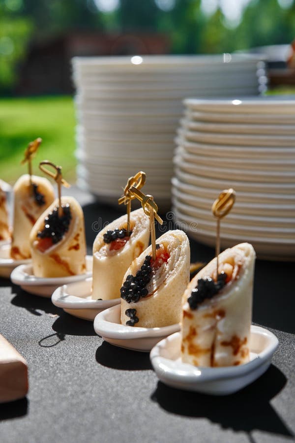 Outdoor Catering Banquet in Summer. Table with Snacks and Canapes at a ...
