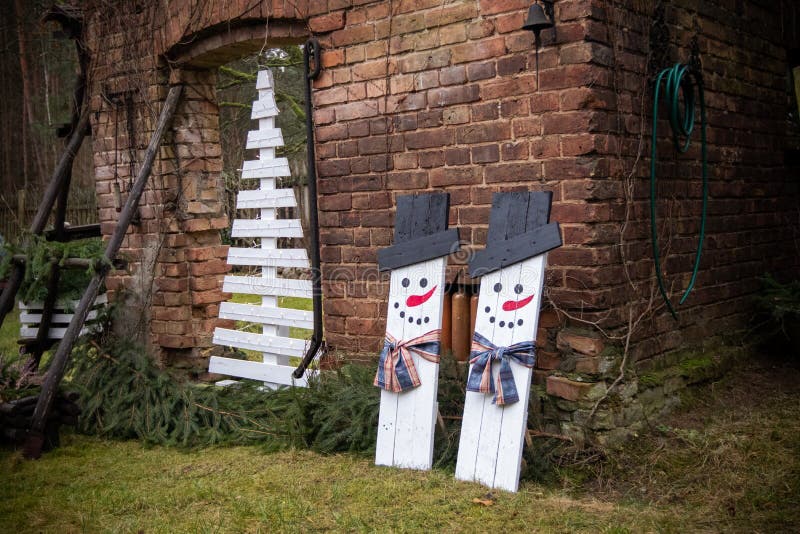 Outdoor Christmas Decorations, Snowman and Christmas Tree Stock Photo ...