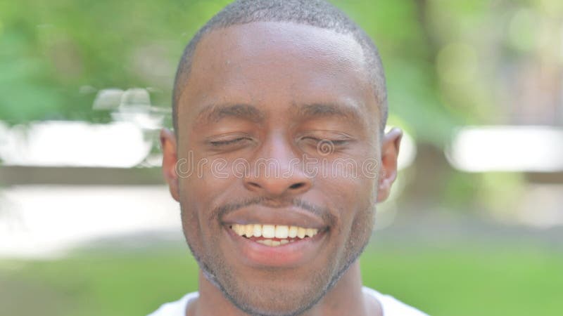 The Outdoor Close Up of Smiling African Man Face Stock Video - Video of ...