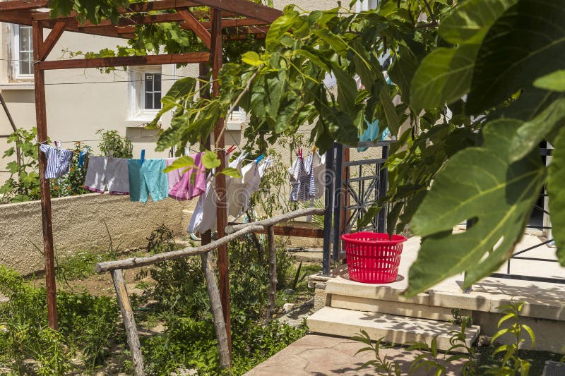 Outdoor Clothesline with Fresh Laundry Stock Photo - Image of colorful ...