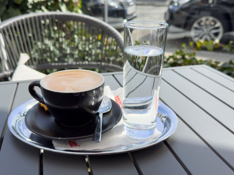 Outdoor Coffee with Glass of Water on Patio Table Editorial Photo ...
