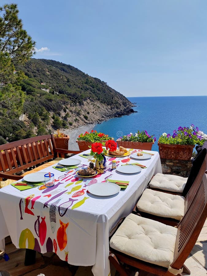 Outdoor Dining Table Set on a Stunning Terrace with Beautiful View of ...