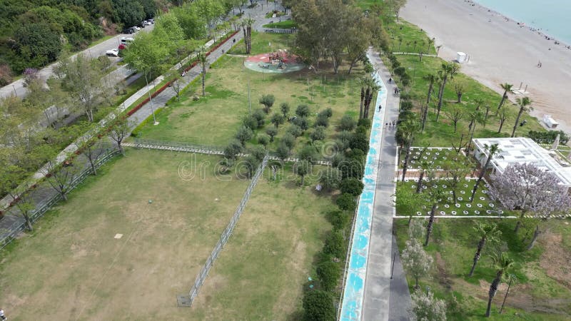 Outdoor Event Setup in Coastal Park Featuring Grassy Areas and ...