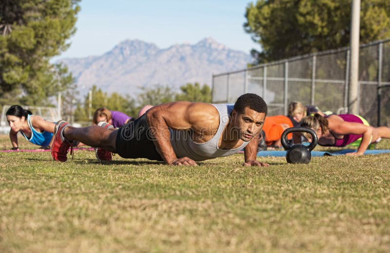 Outdoor Exercise Bootcamp stock image. Image of instructor - 37934675