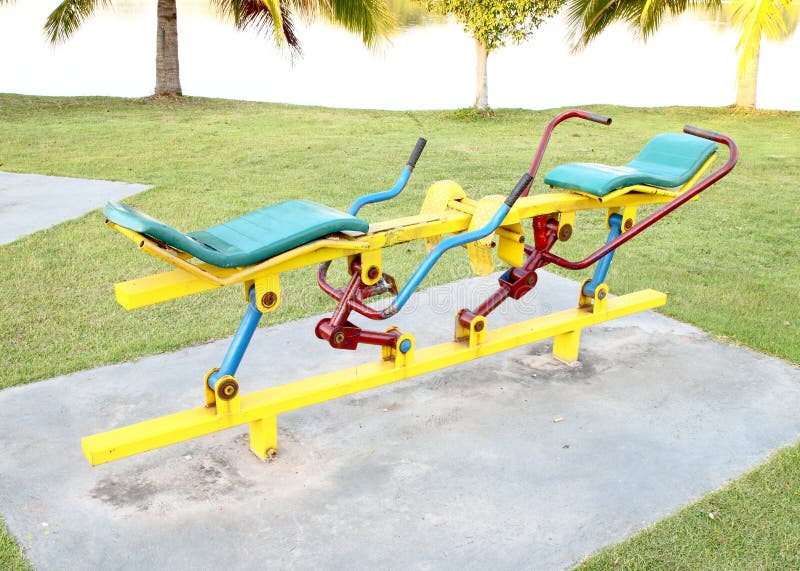 Outdoor exercise machine stock photo. Image of grass - 27672672