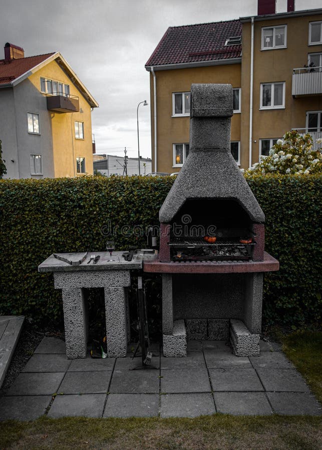 Outdoor Fireplace in the Backyard during the Evening Stock Image ...