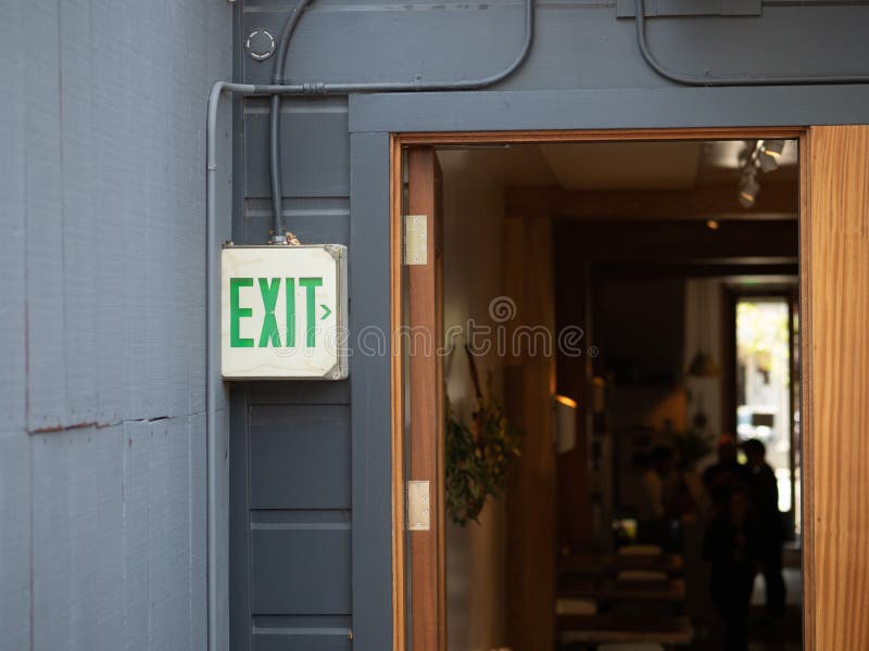 Outdoor Green Exit Sign Leading To Inside Building Restaurant Stock ...