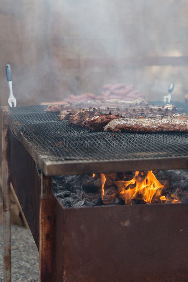 Outdoor Grilled Meat: Steaks and Sausages Stock Photo - Image of fire ...