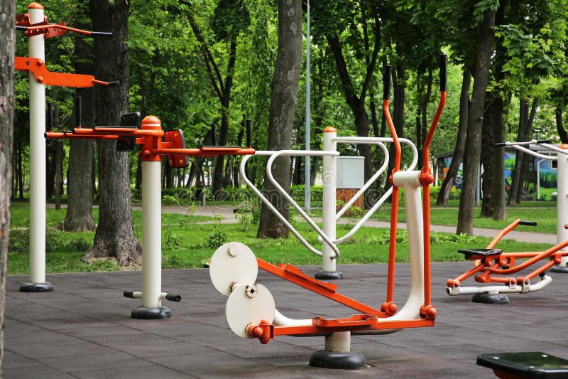 Empty Outdoor Gym with Ovate Stepper, Rowing Machine and Push Up Bars ...