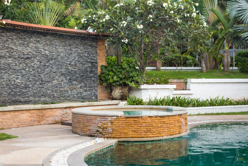 Jacuzzi in the garden stock image. Image of property - 72768189