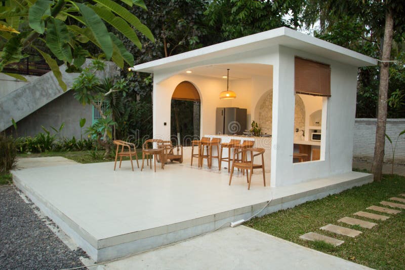 Outdoor Kitchen and Dining Area in a Garden Stock Image - Image of ...