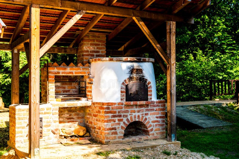 Outdoor Kitchen with Pizza Oven and Barbeque Grill Stock Image - Image ...