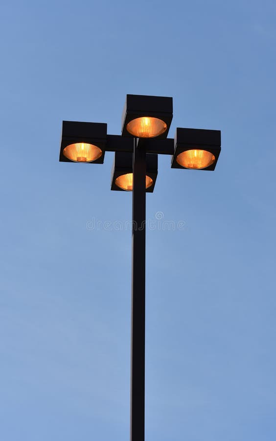 Outdoor Light Pole with Four Fixtures Stock Image - Image of light ...