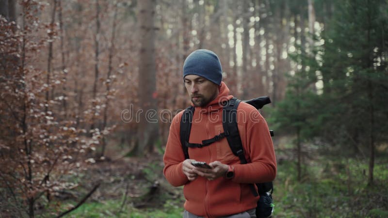 Outdoor Mapping in Hike. Man Hiker Uses Smartphone To Navigate in ...
